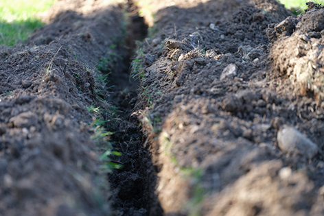 How to drain a soggy lawn